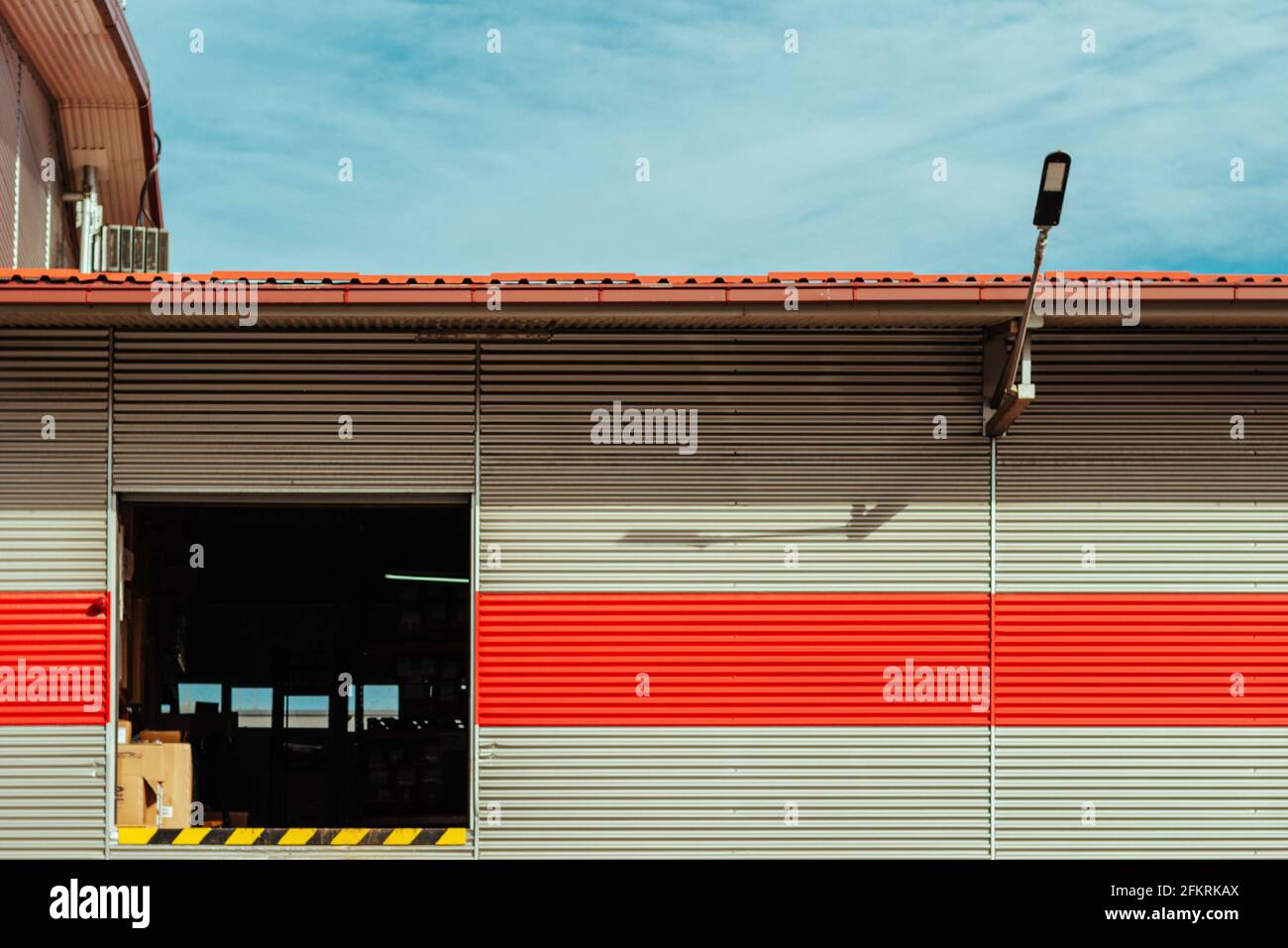 metal industrial hangar with open cargo doors Stock Photo - Alamy