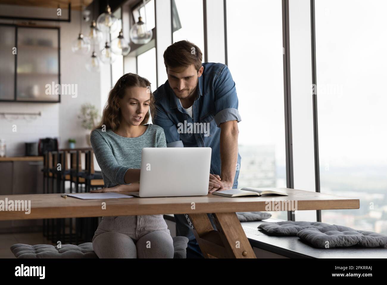 Male female employees talking online hi-res stock photography and ...
