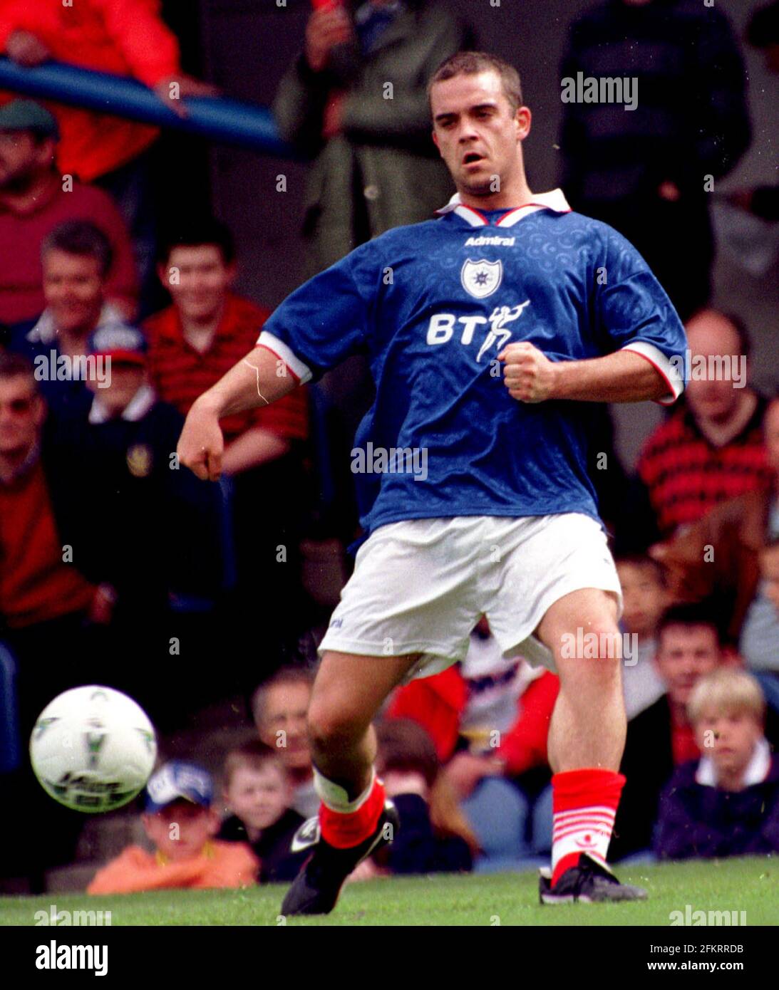 POP STAR ROBBIE WILLIAMS PLAYING IN PAUL WALSH'S TESTIMONIAL AT FRATTON ...