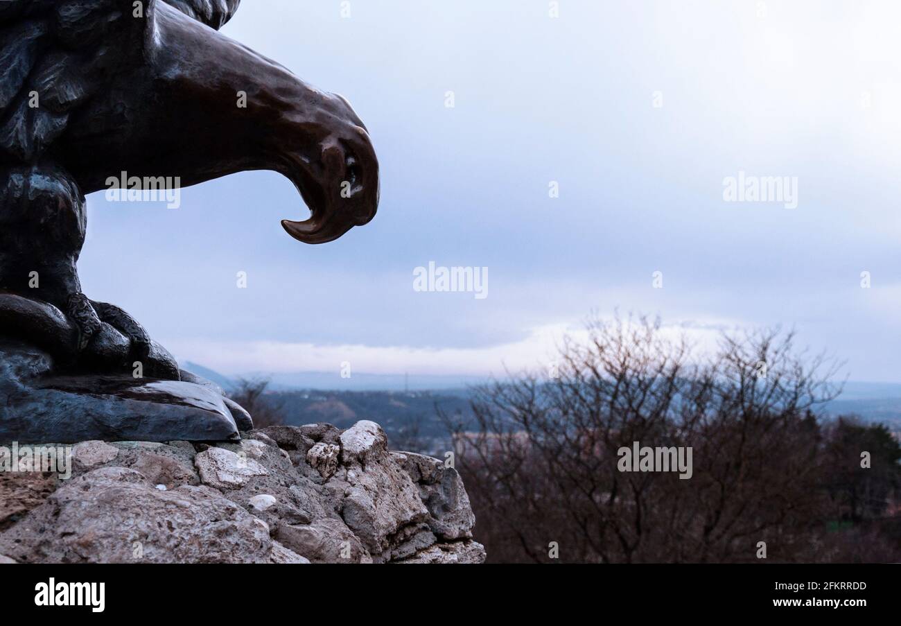 view of mountain ranges from the observation deck near bronze sculpture ...