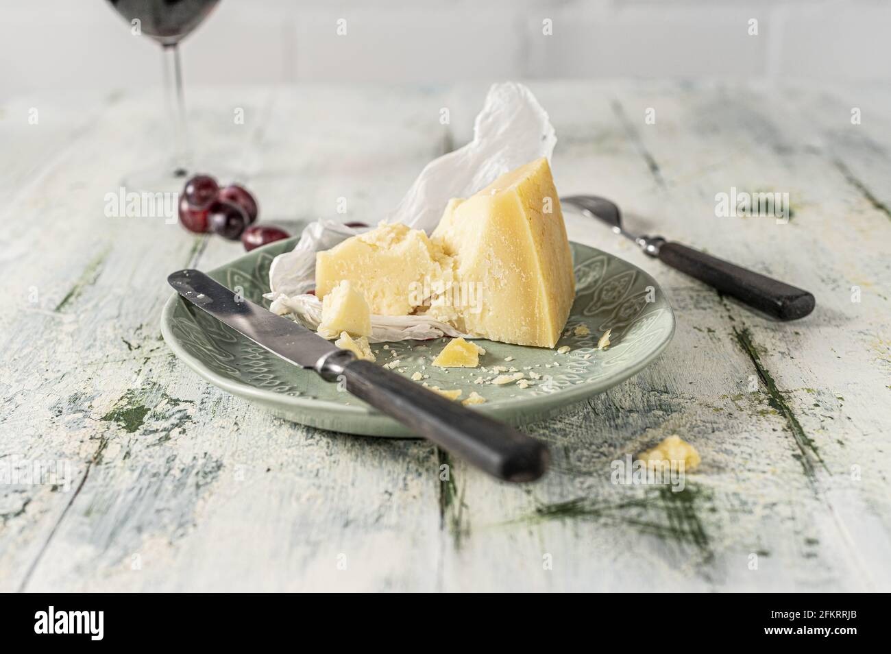 Closeup shot of a piece of cheese on a plate Stock Photo - Alamy