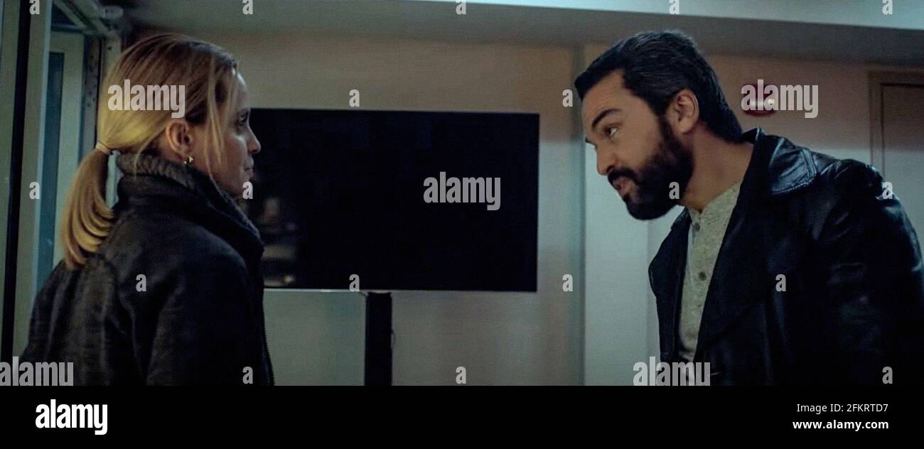 LOCKED IN, from left: Mena Suvari, Manny Perez, 2021. © Saban Films ...