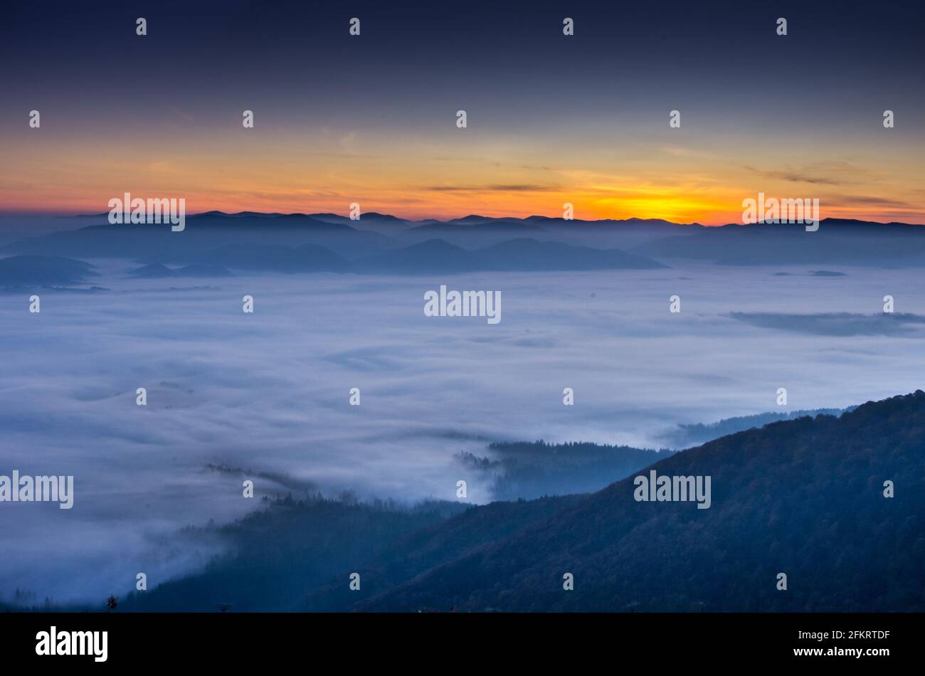 Early dawn. The rising of the sun above the clouds. Expectation of the ...