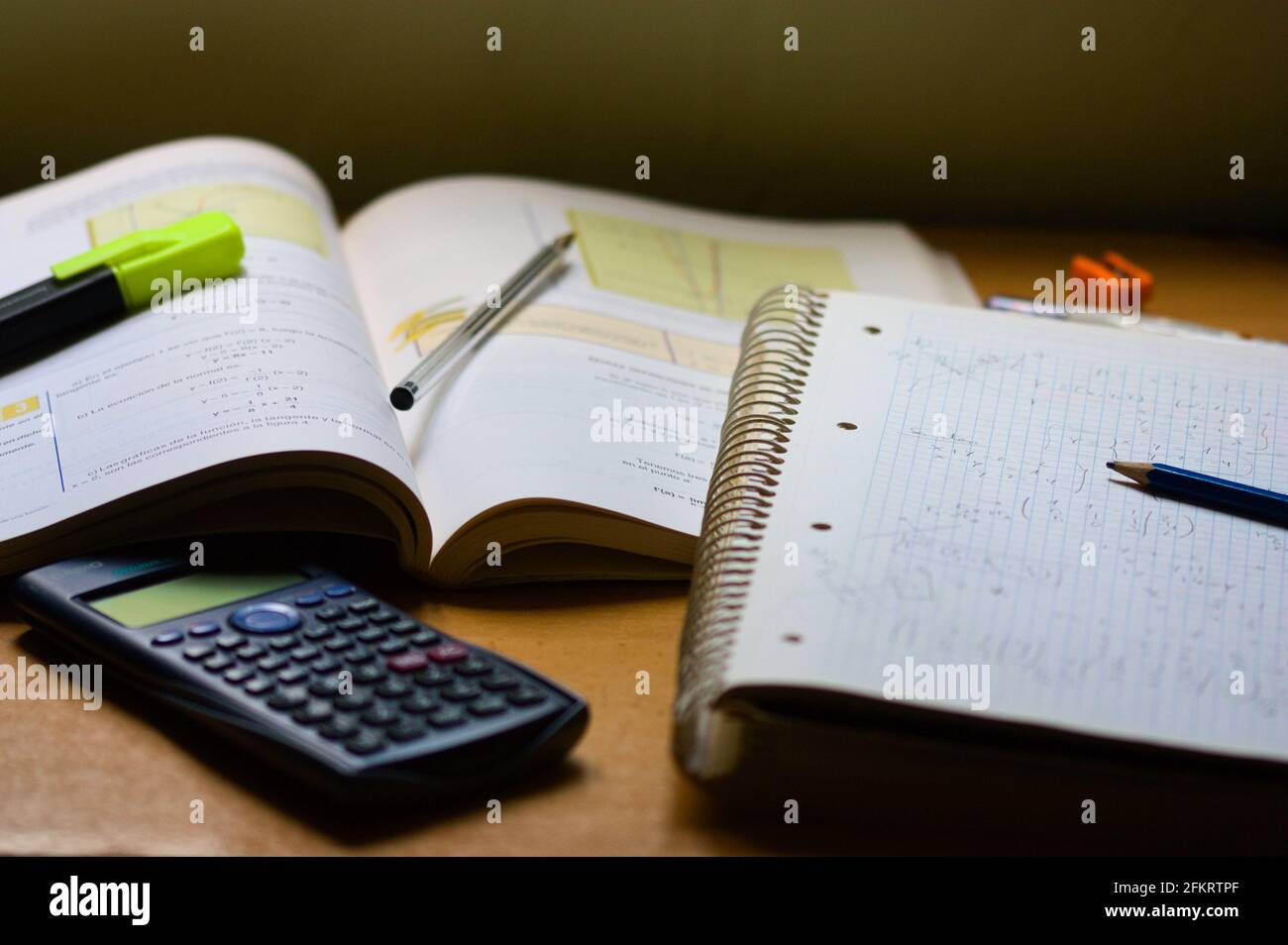 Table of someone who is studying mathematics, in which there is a book ...