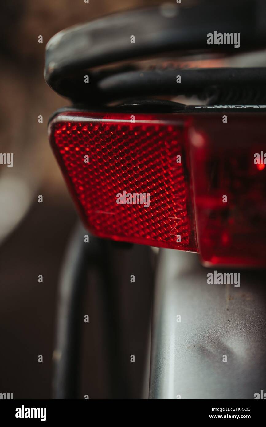 Vertical shot of a red retroreflector on a back of a bike Stock Photo ...