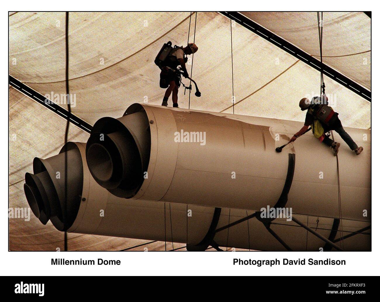 Vacuming dust on air duct in the Millennium Dome June 1999 Stock Photo ...
