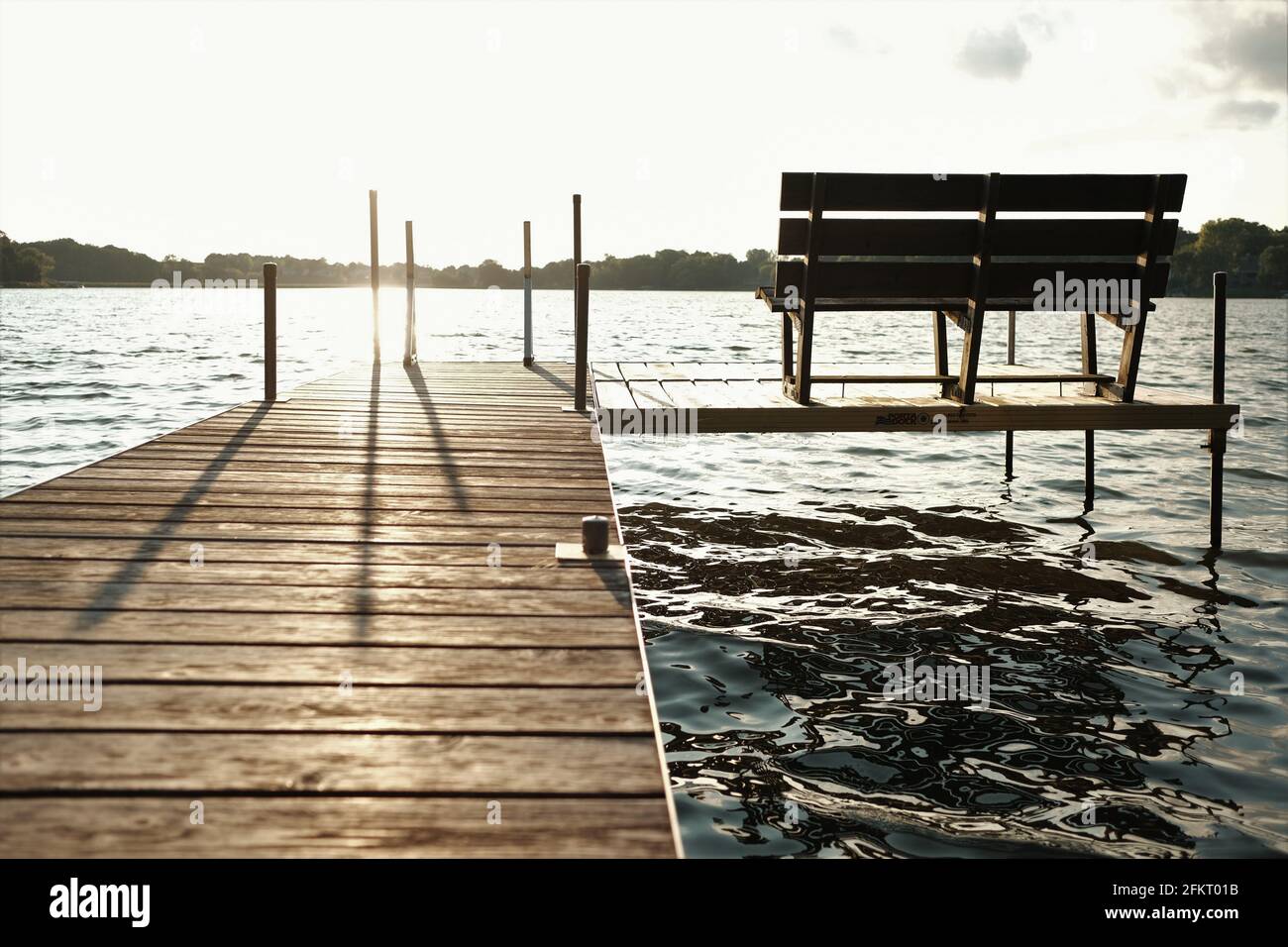 Summer Night, Watching Sunset from Dock on Minnesota Lake Stock Photo ...