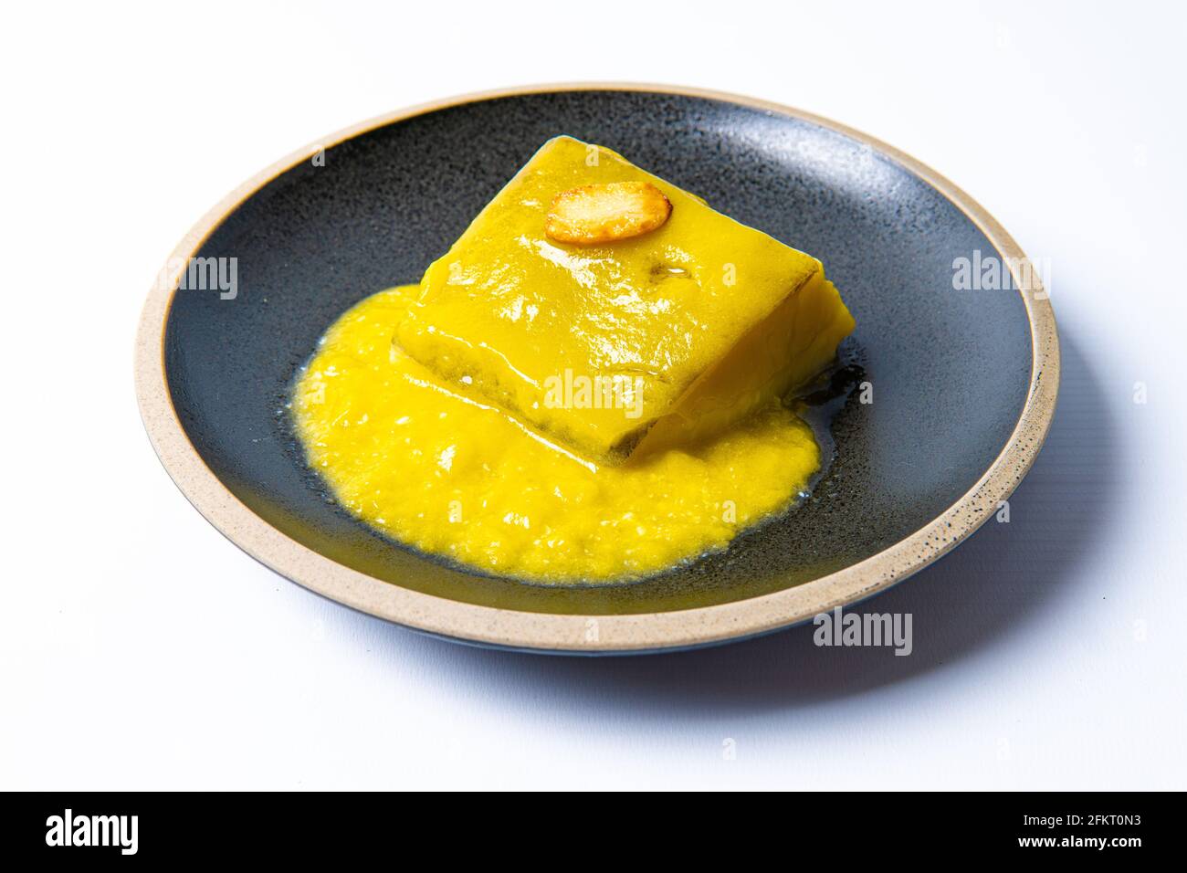 cod al pil pil on white background. typical food of the Basque country ...