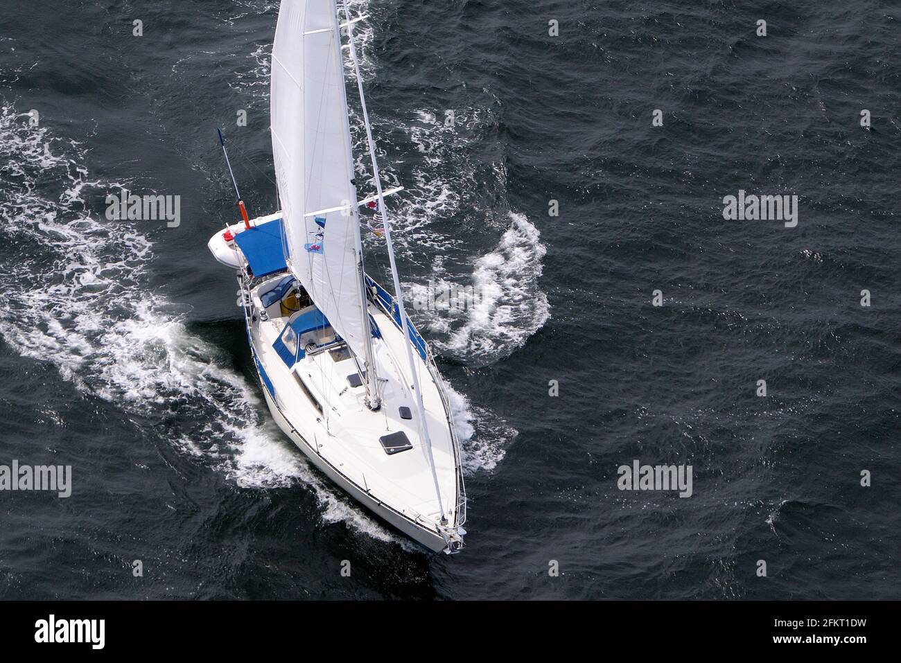 Aerial photograph of a sailboat in the Southern Gulf Islands, British ...