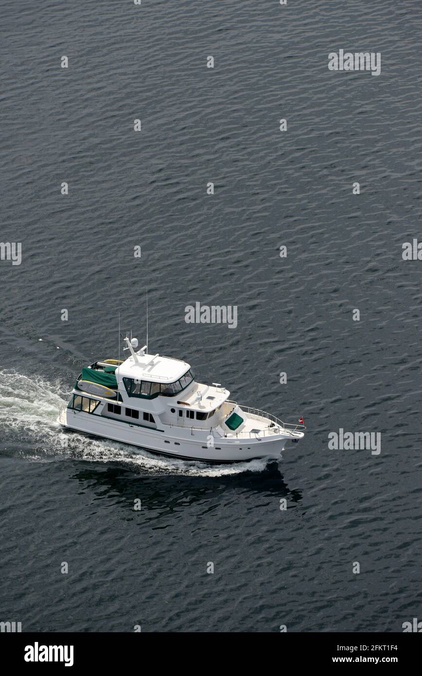 Aerial photo of a motorboat in the Southern Gulf Islands, British ...