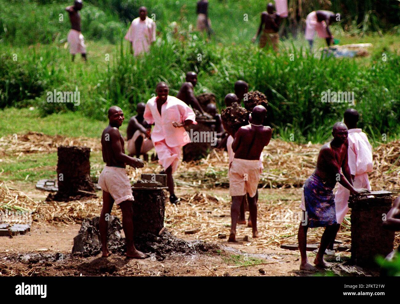 Prisoners doing building work at Kigali February 1999 in Rwanda outside ...