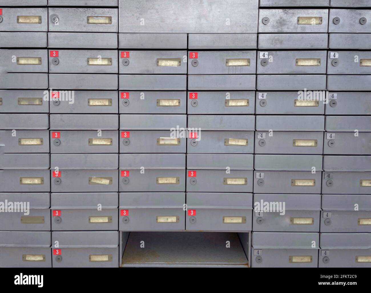 Closeup of old rusty metal mailboxes with locks under the lights Stock ...