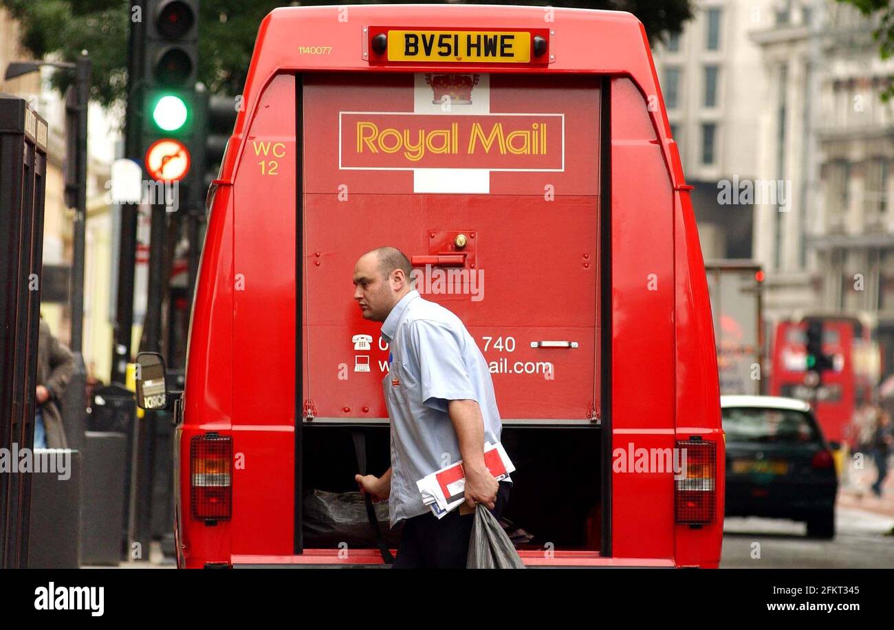 A postal worker in Central London today Stock Photo - Alamy