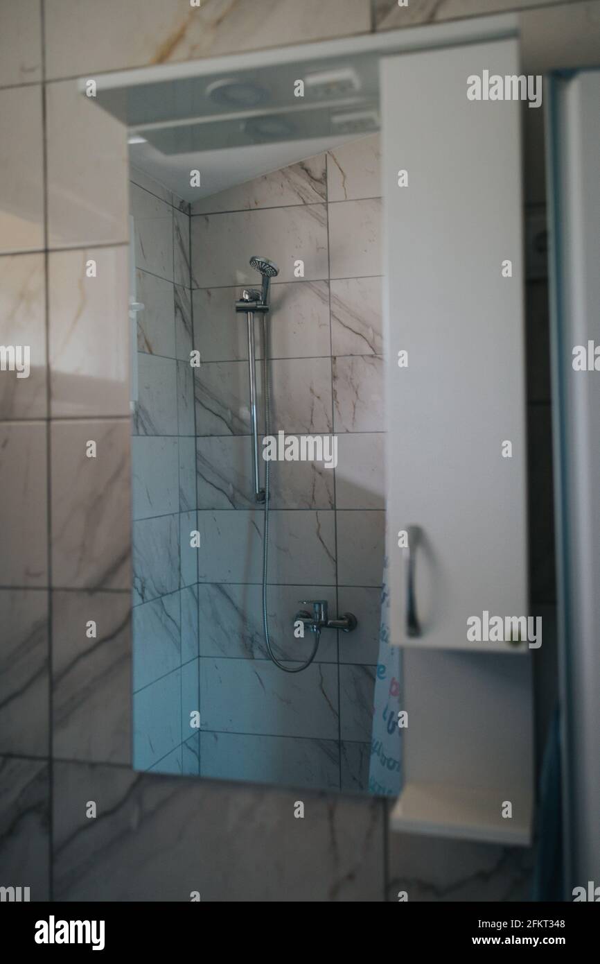 Vertical shot of the inside of a modern shower box with an elegant ...