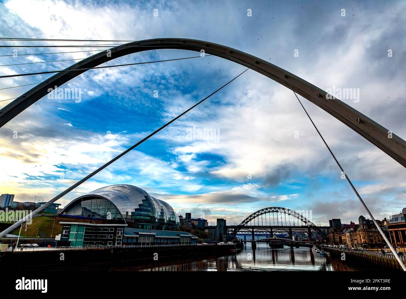 Curved span of the Millennium pedestrian bridge over the River Tyne ...