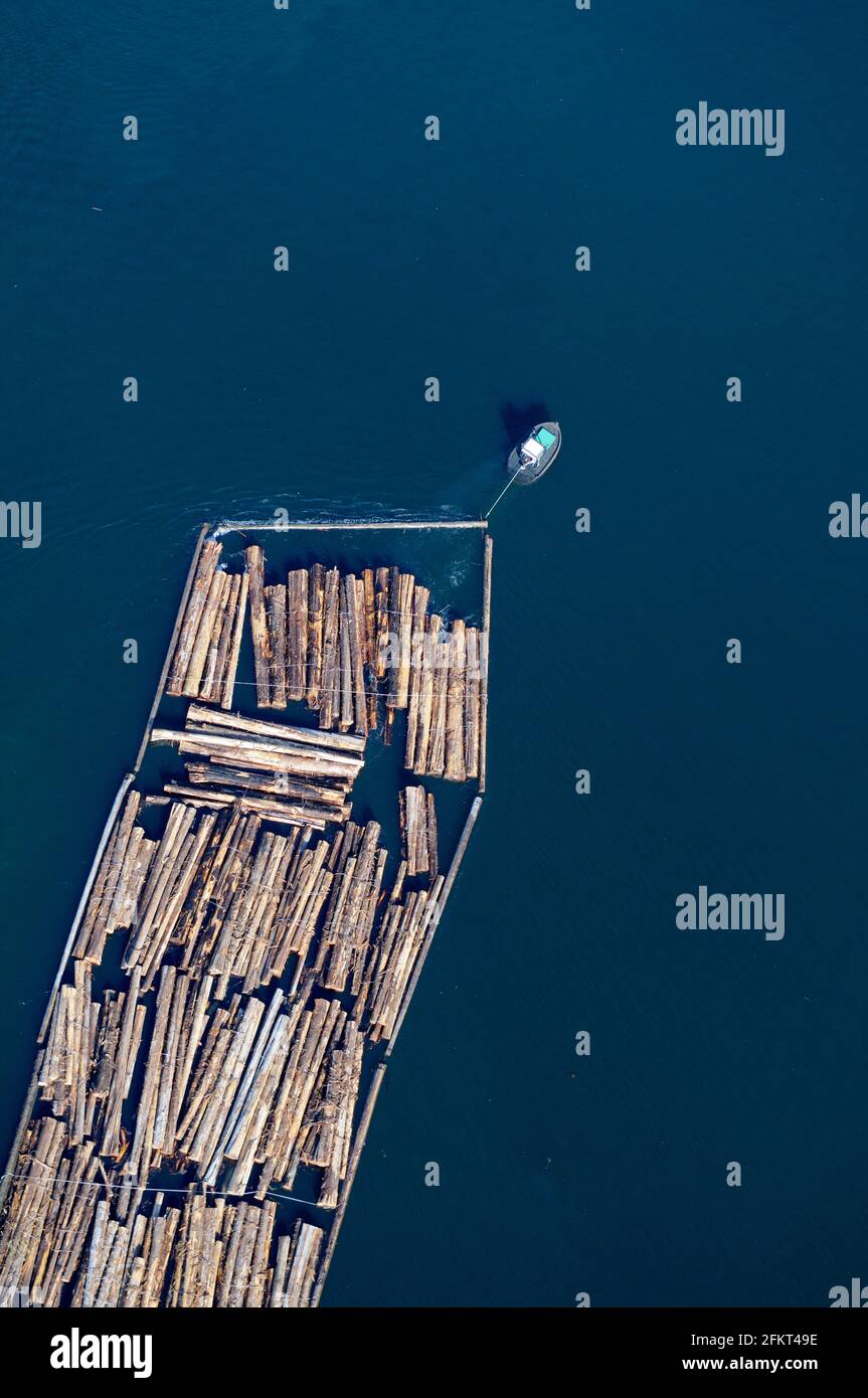 Log boom being towed in Ladysmith Harbour, Vancouver Island aerial ...