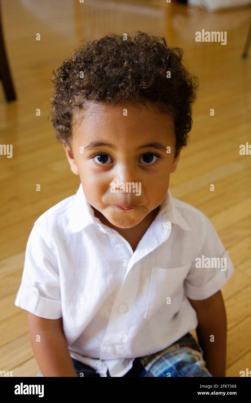 High angle portrait of preschool boy looking at camera smiling Stock ...