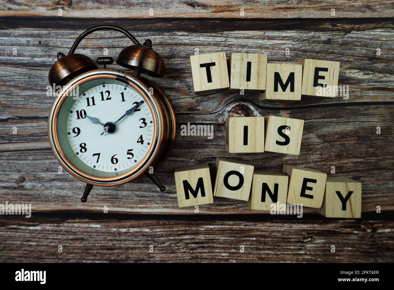 Time Is Money Word alphabet letters on wooden background Stock Photo ...
