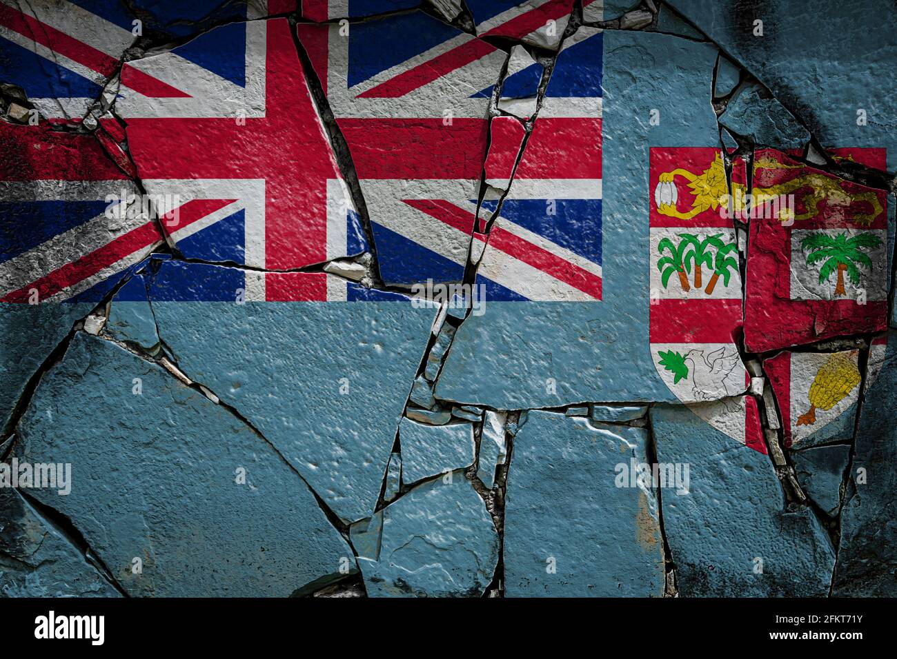 National flag of Fiji depicting in paint colors on an old stone wall ...