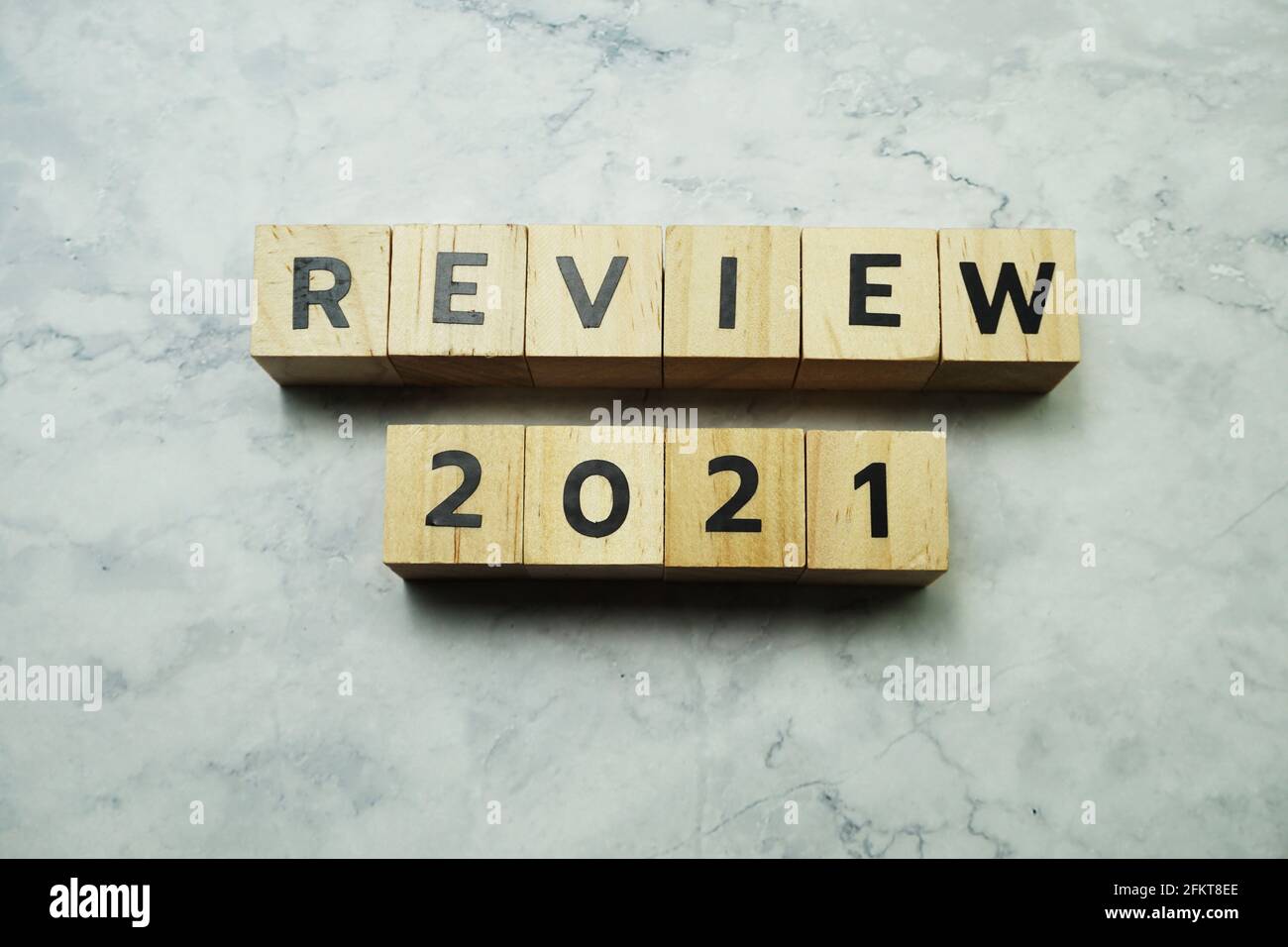 Review 2021 word alphabet letters on marble background Stock Photo - Alamy