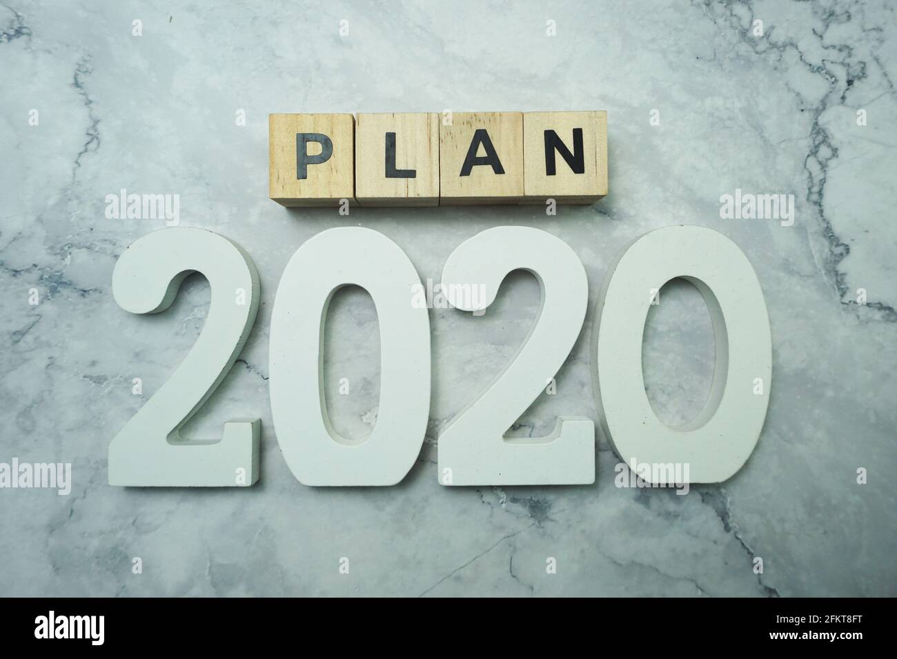 Plan 2020 alphabet letter on marble background Stock Photo - Alamy