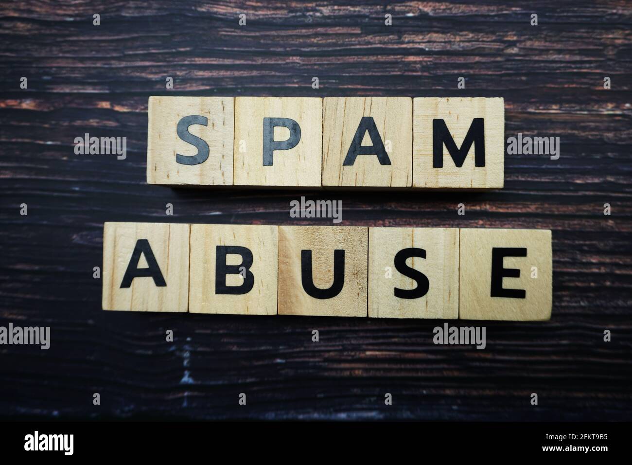 Spam Abuse alphabet letter on wooden background Stock Photo - Alamy