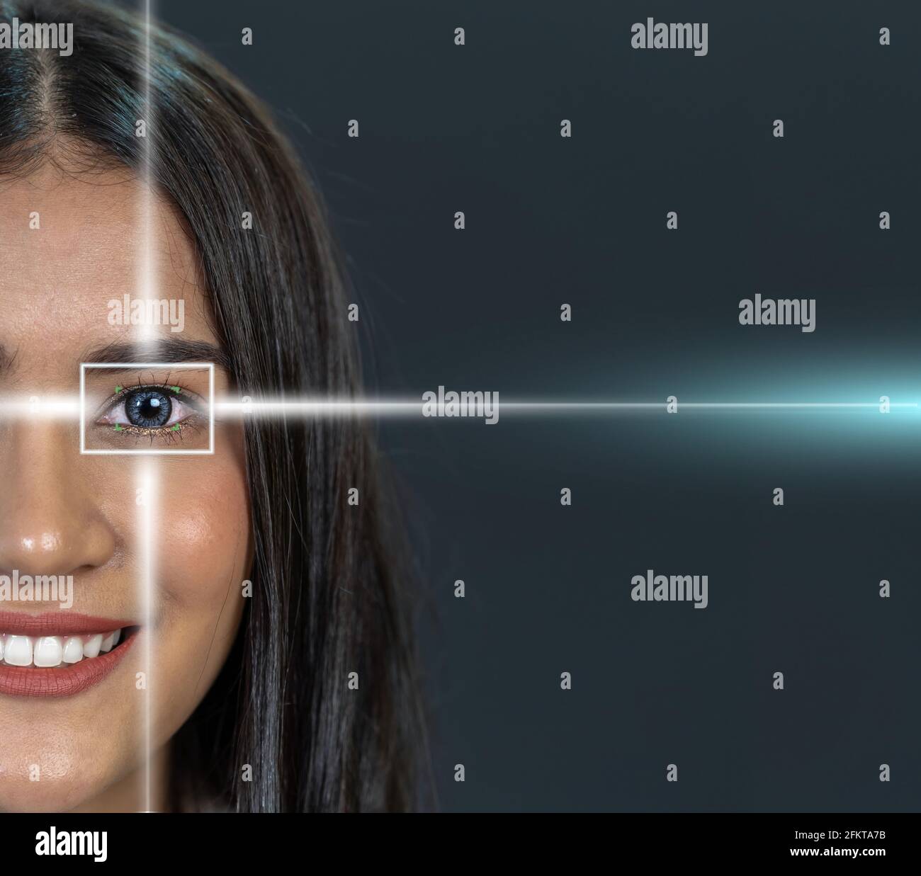 Eye scanning of asian young woman by laser light over the dark ...