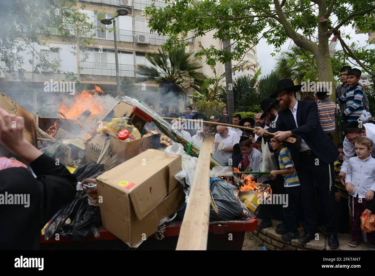 Orthodox Jews burning bread and Chametz as part of the preparations for ...