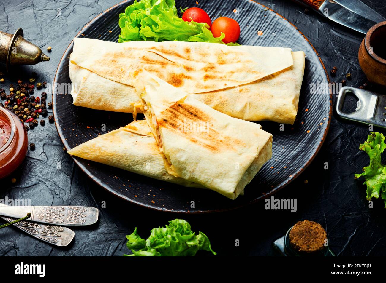 Delicious oriental shawarma with cheese, chicken and mushrooms.Oriental ...