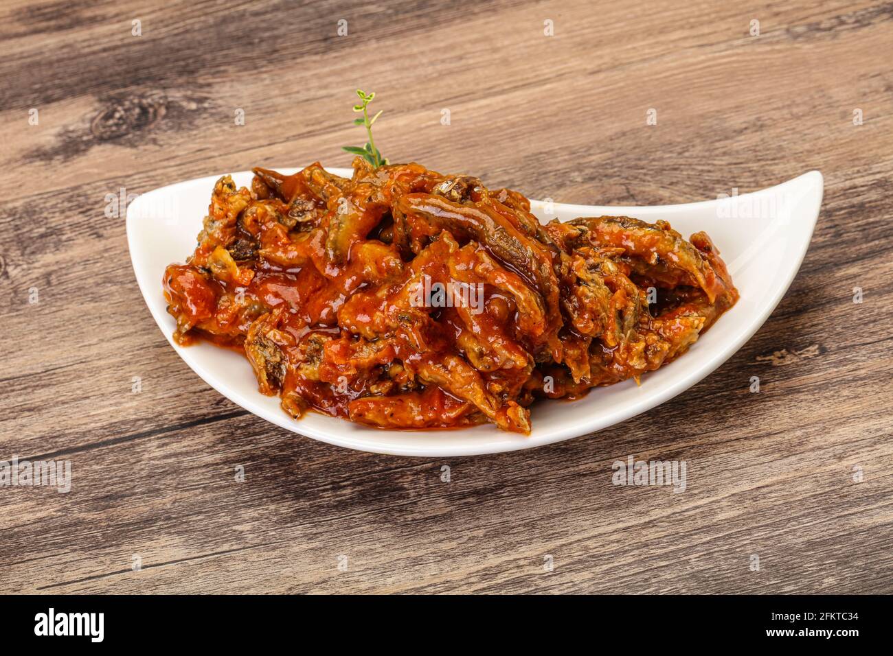 Canned anchovy snack in tomato sauce Stock Photo - Alamy