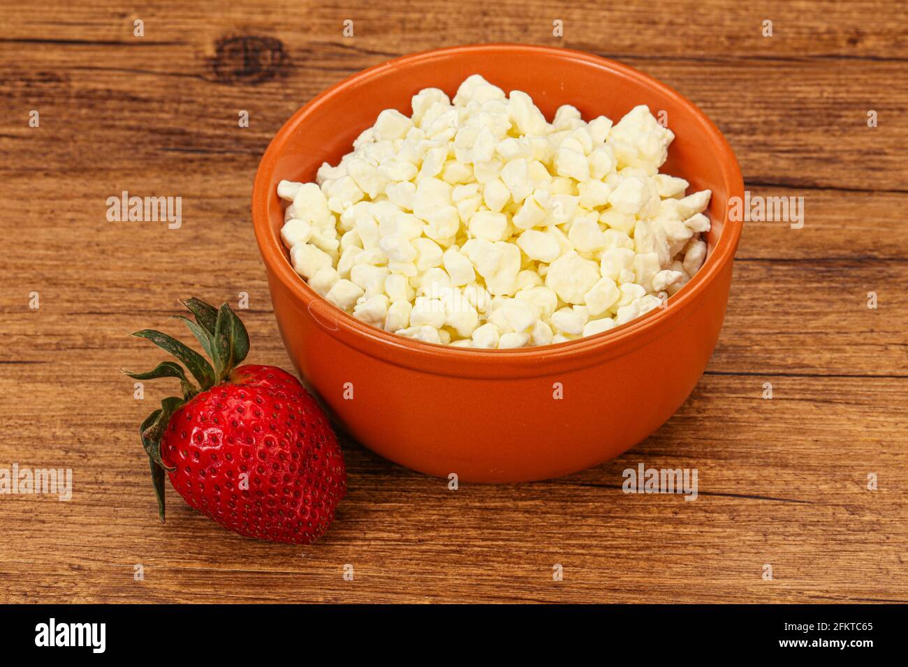 Dietary food - grain cottage cheese in the bowl Stock Photo - Alamy