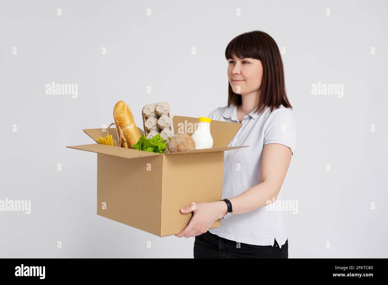 Woman charity shop box hi-res stock photography and images - Alamy