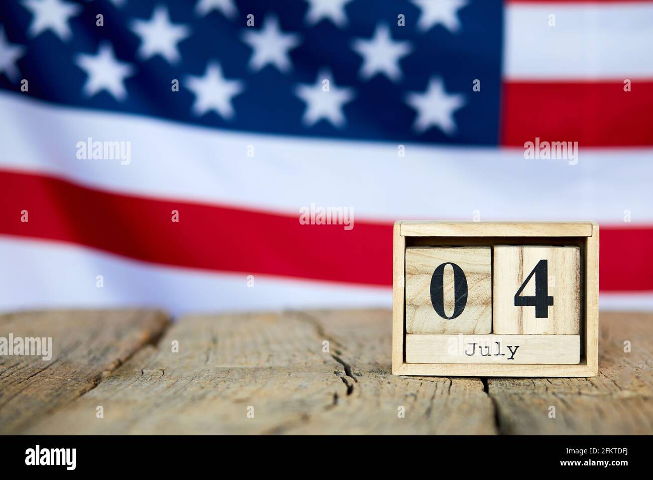 Wooden calendar with date on the background of the USA flag. Template ...
