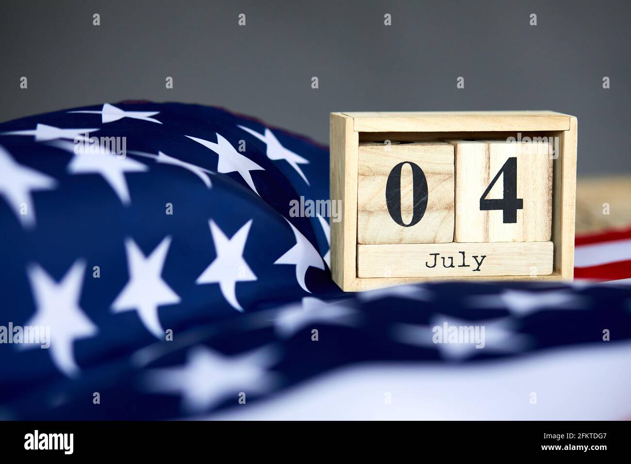 Wooden calendar with date on the background of the USA flag. Template ...