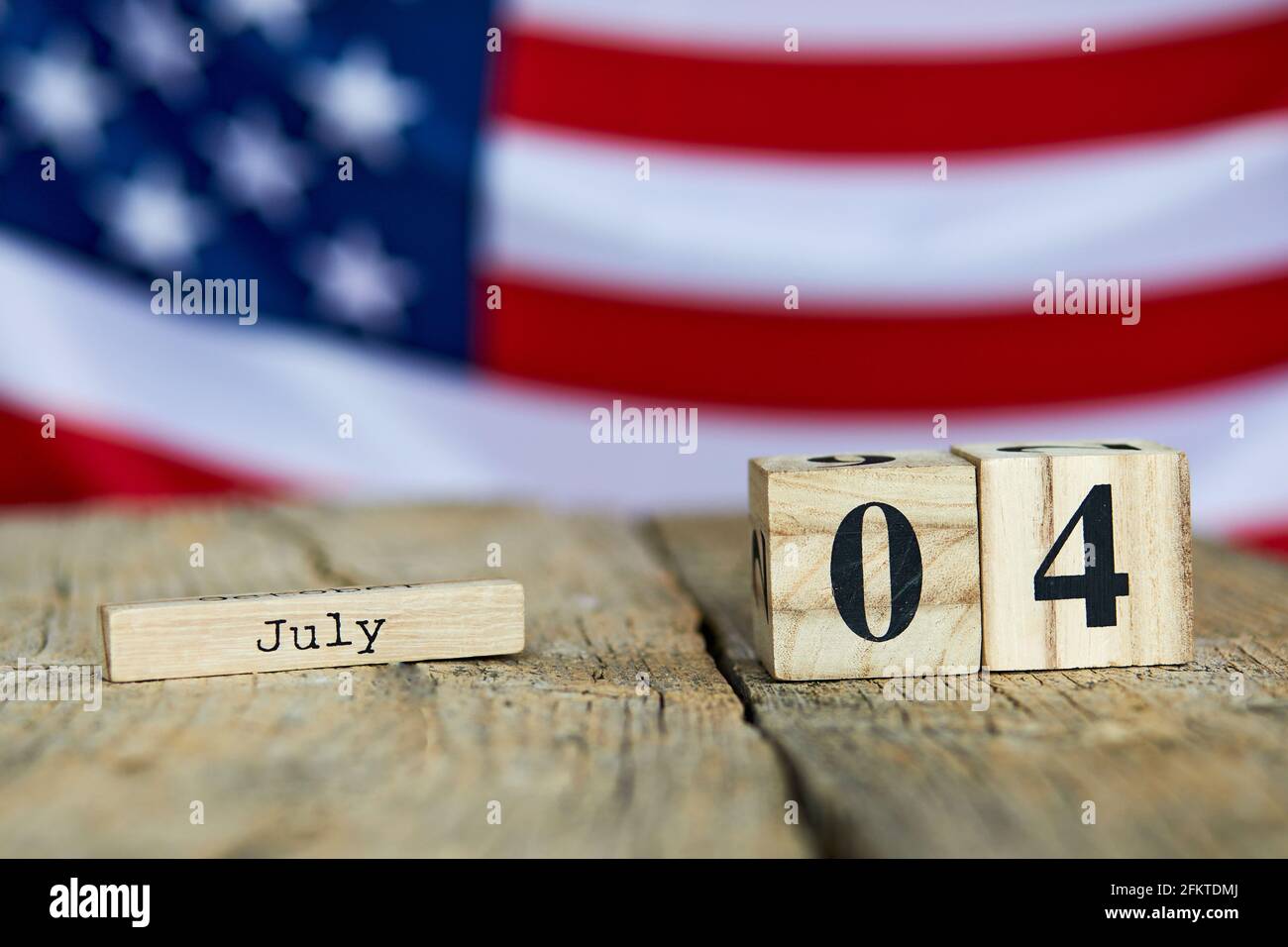 Wooden calendar with date on the background of the USA flag. Template ...