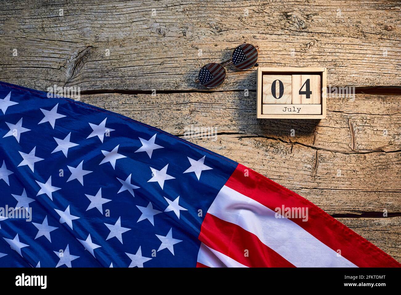 Wooden calendar with numbers on which the image of America's ...