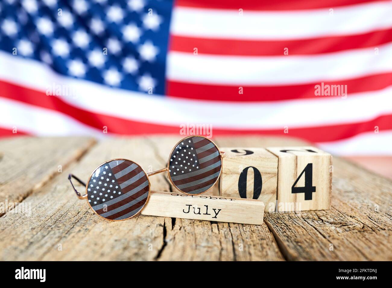 Wooden calendar with numbers on which the image of America's ...