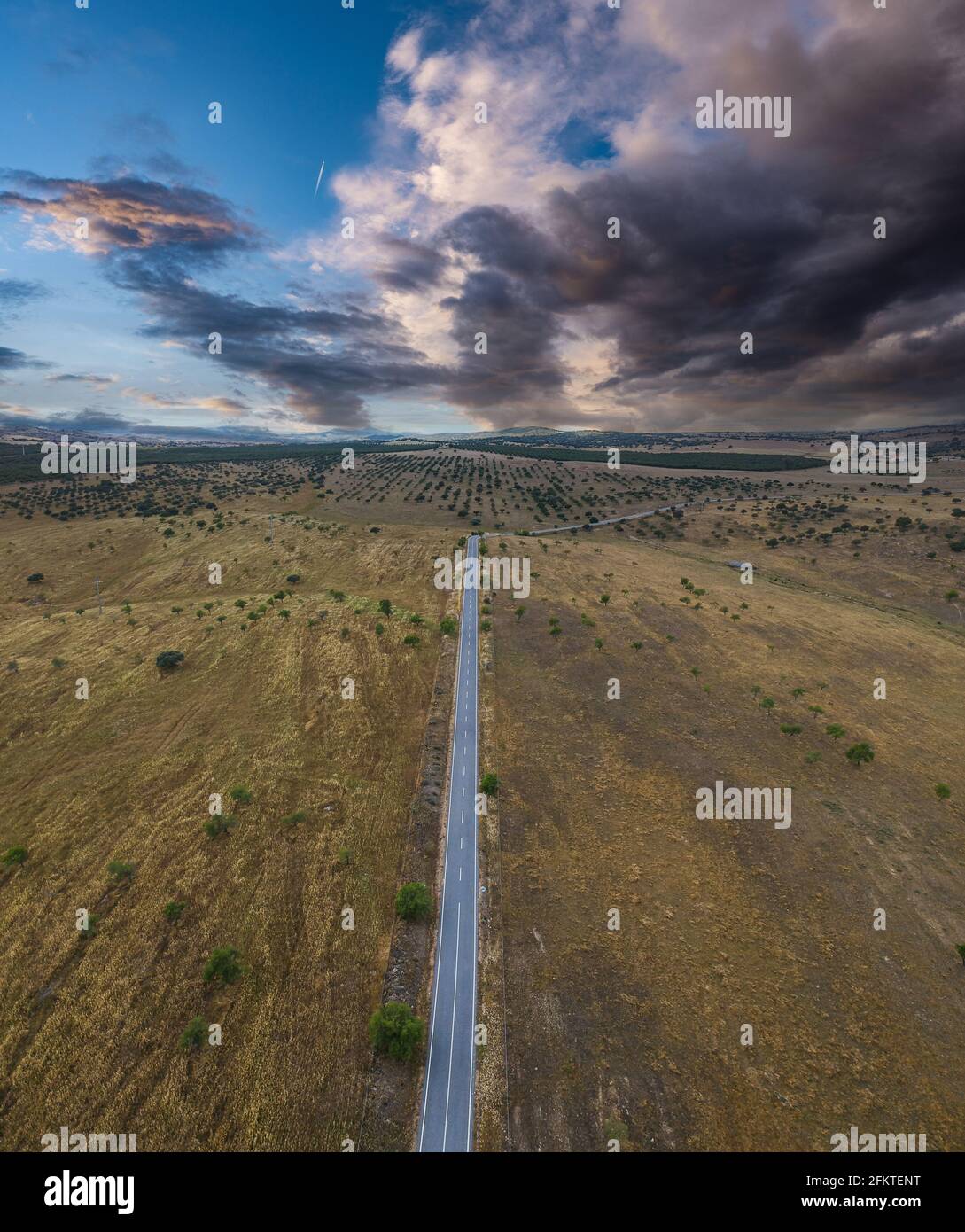 Aerial view of a country road in spring at the sunset Stock Photo - Alamy