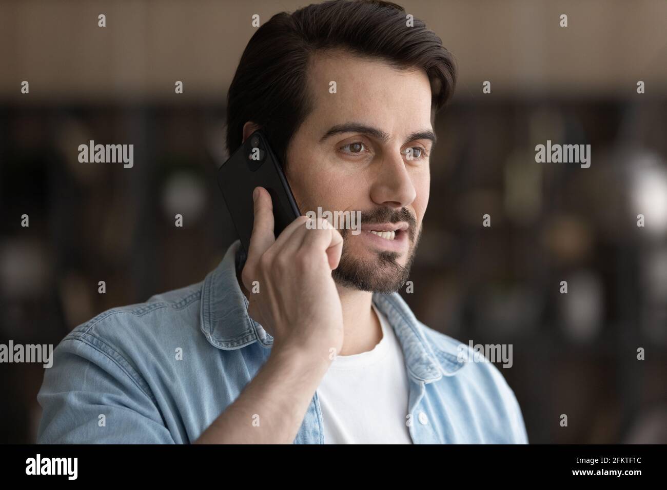 Close up smiling man talking on smartphone, making call Stock Photo - Alamy