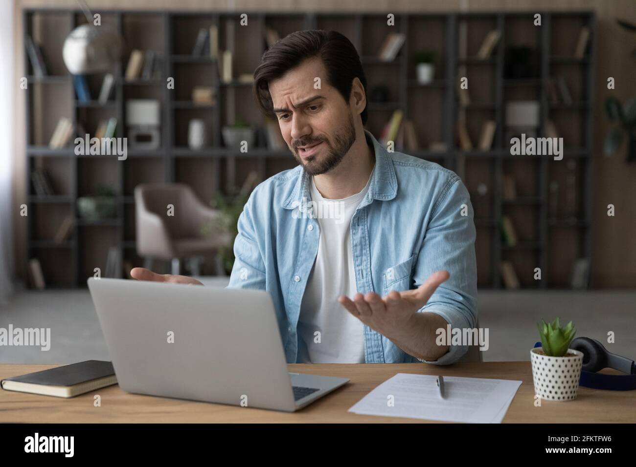 Frustrated man looking laptop screen hi-res stock photography and ...