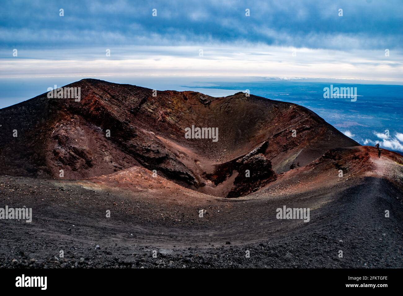 Etna volcano in Sicily under cloudy sky Stock Photo - Alamy