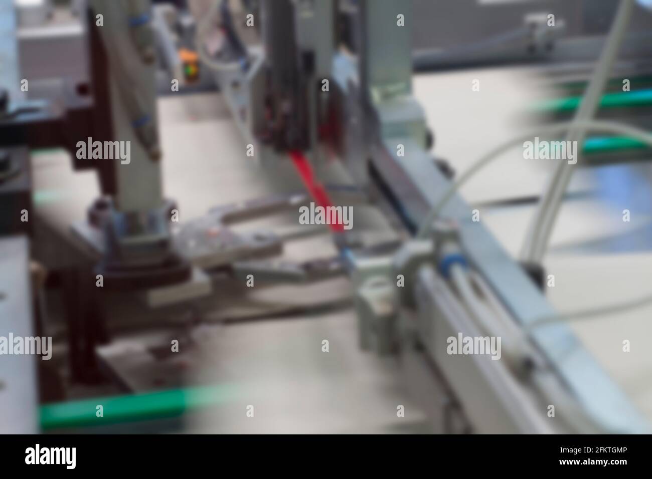 Blurred image showing the interior or a production facility, no people ...