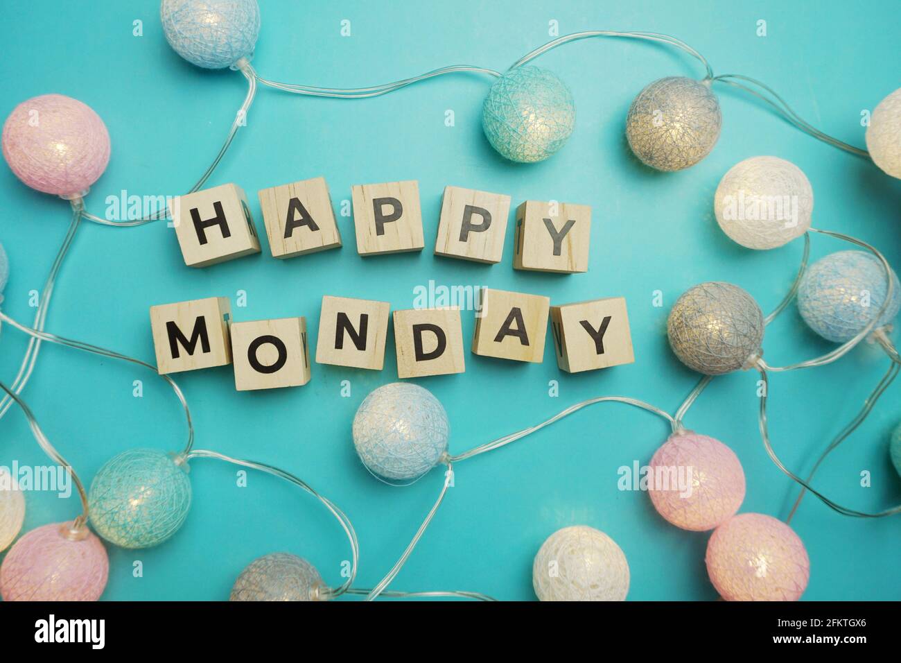 Happy Monday alphabet letter with LED Cotton ball Decoration on blue ...