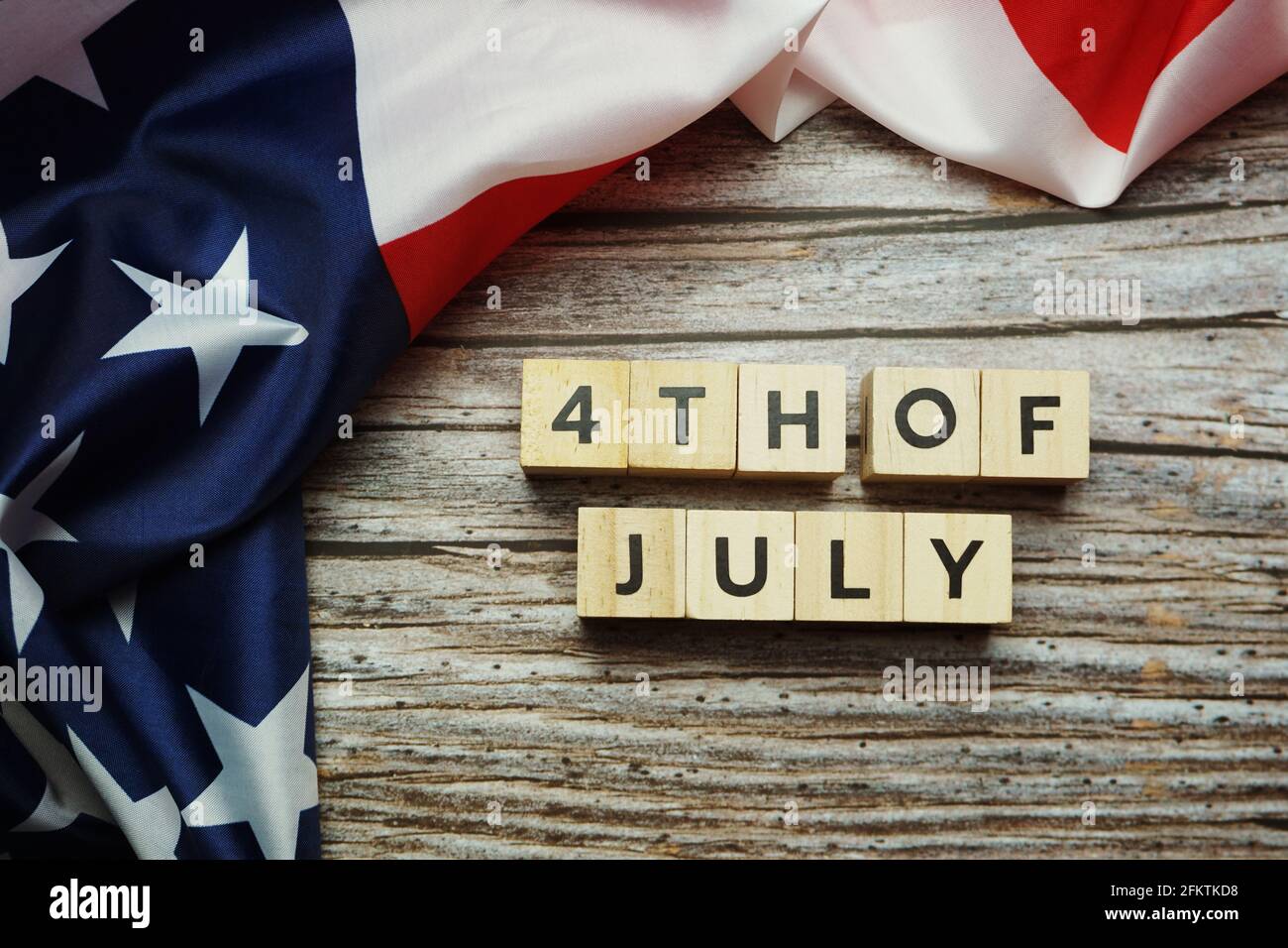 Fourth of July alphabet letter on wooden background Stock Photo - Alamy
