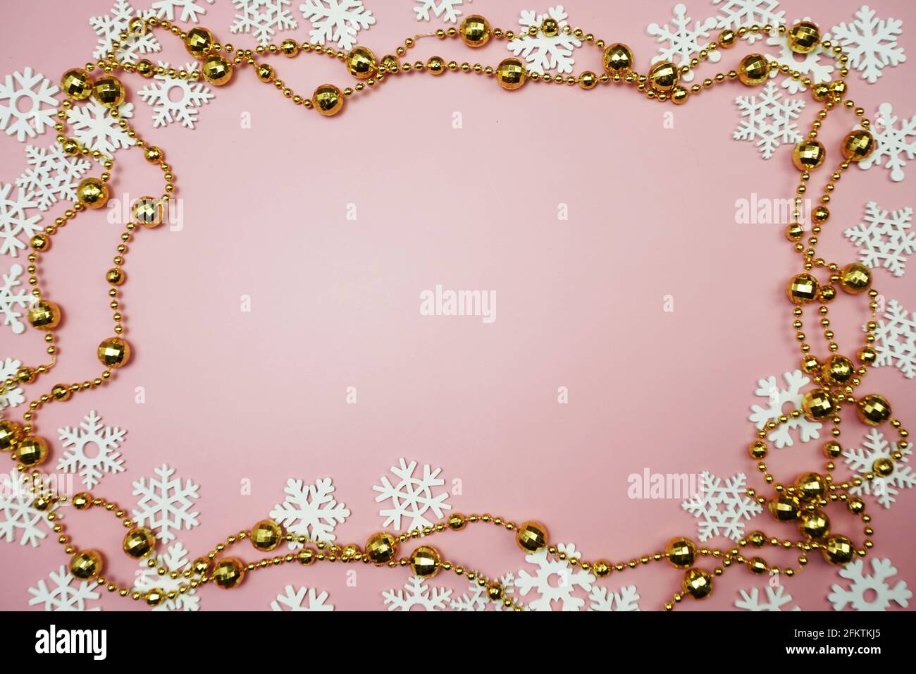 Christmas Ornament border frame on pink background Stock Photo - Alamy