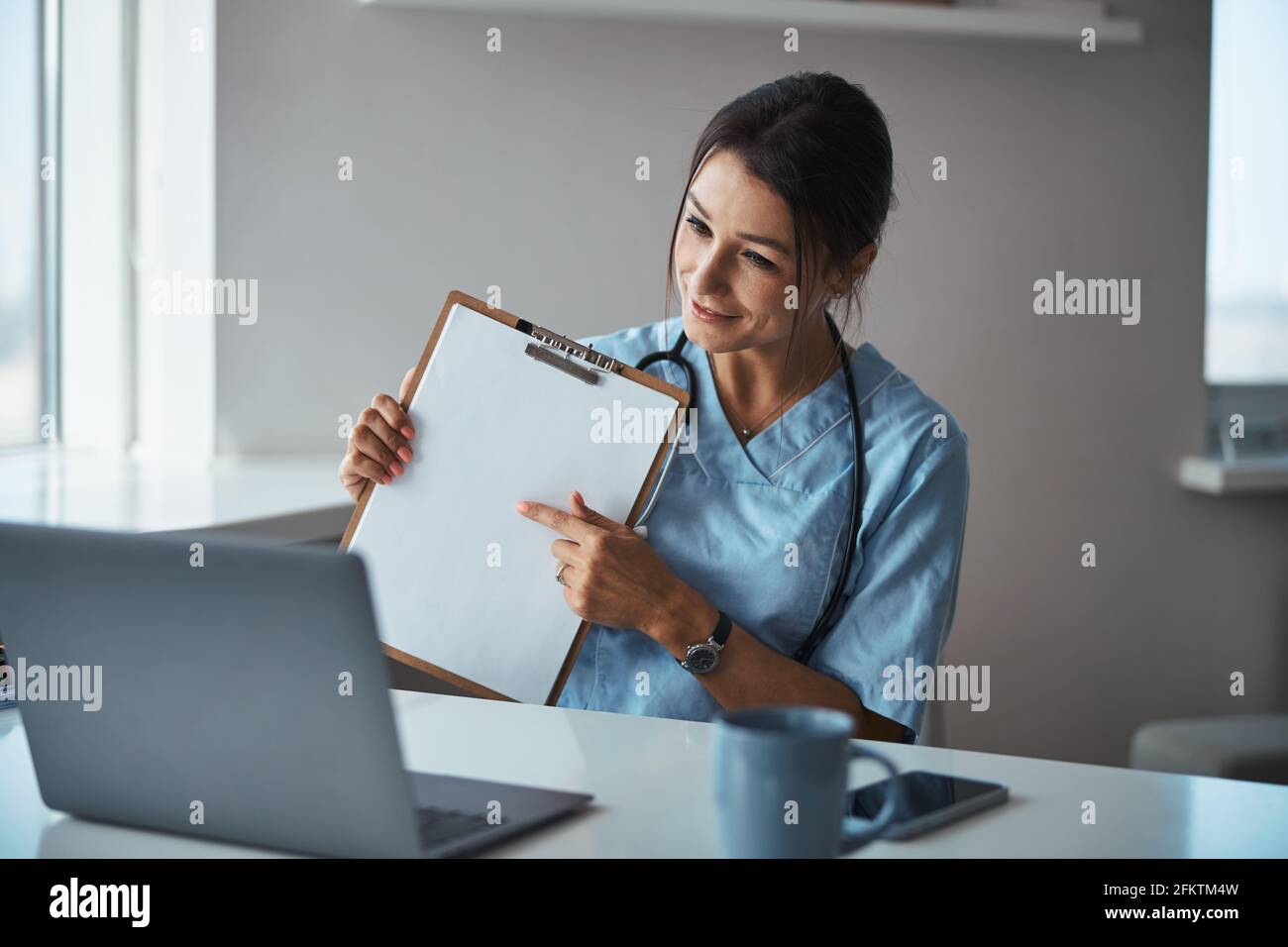 Female doctor giving online consultation hi-res stock photography and ...