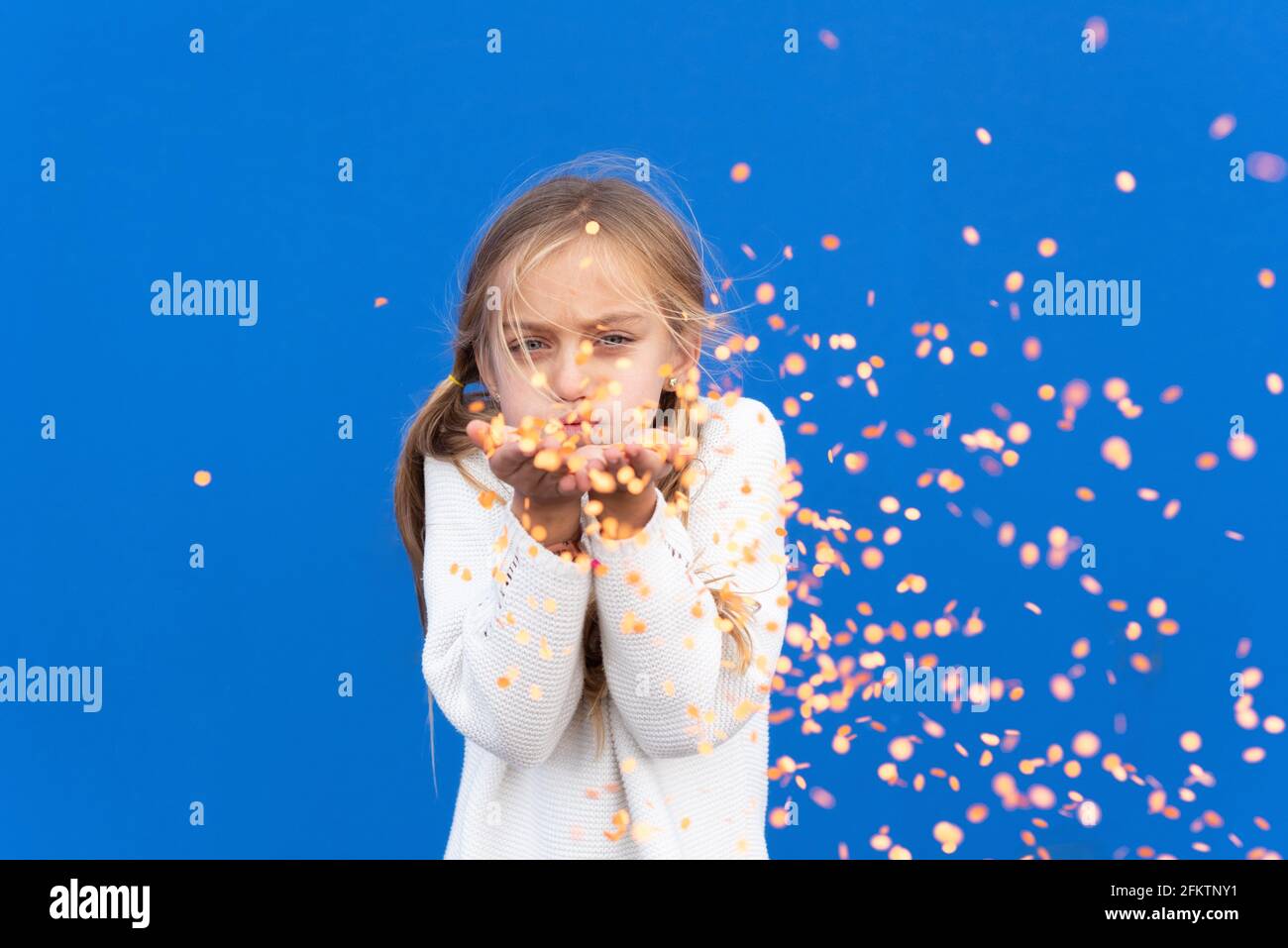 Child confetti girl hi-res stock photography and images - Alamy