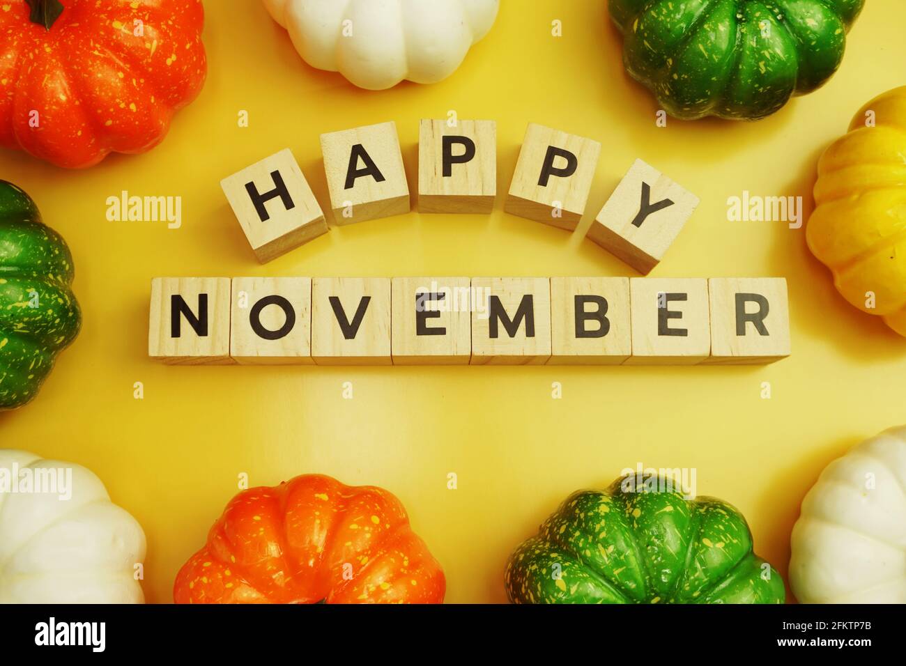 Happy November alphabet letter with pumpkin frame on yellow background ...