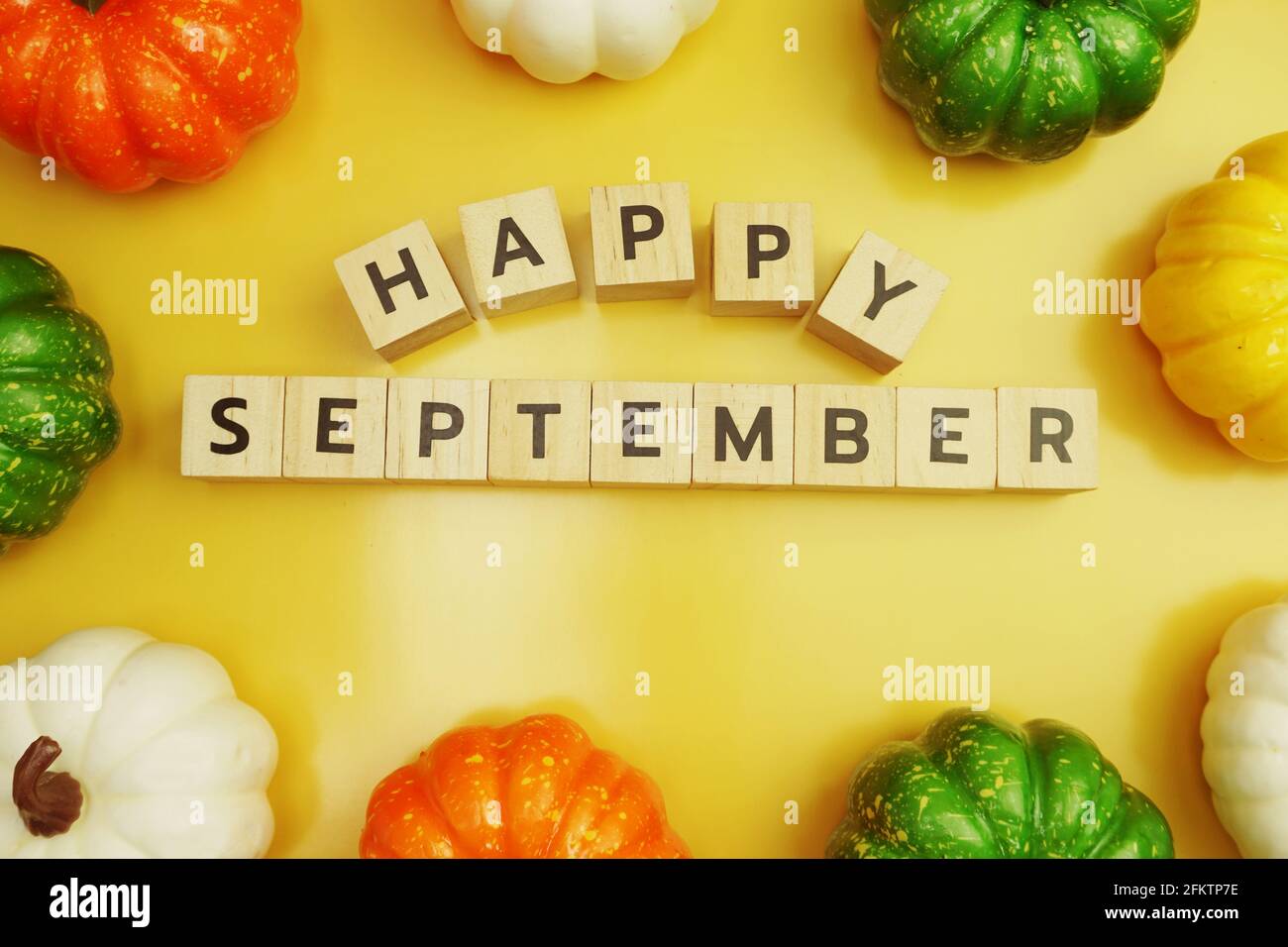 Happy September alphabet letter with maple leaves frame on yellow ...