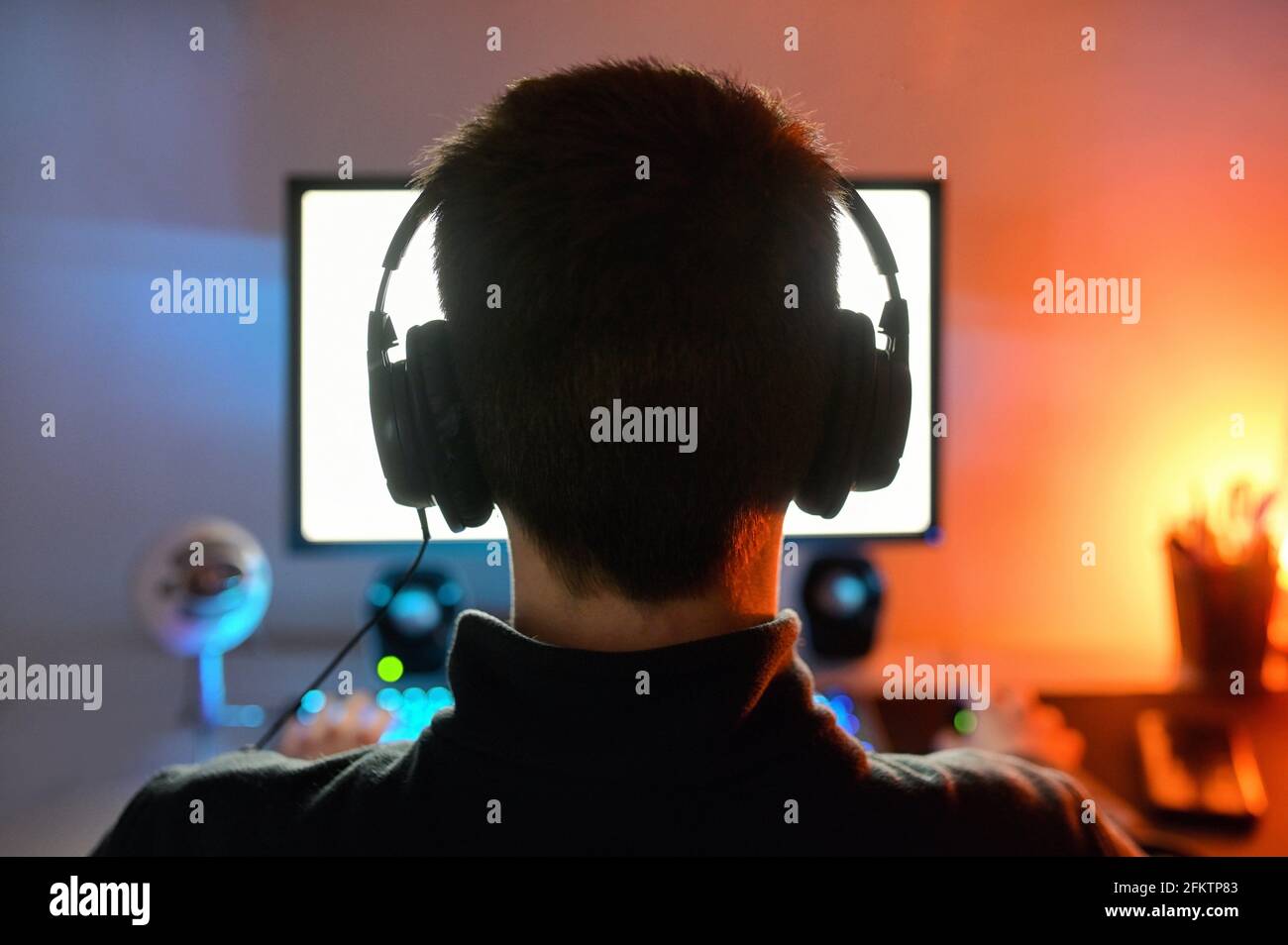 Young Man Playing A Video Game shoot from Behind Stock Photo - Alamy